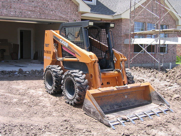 Case 70XT skid steer equipped with McLaren Nu-Air solid cushion tires ...